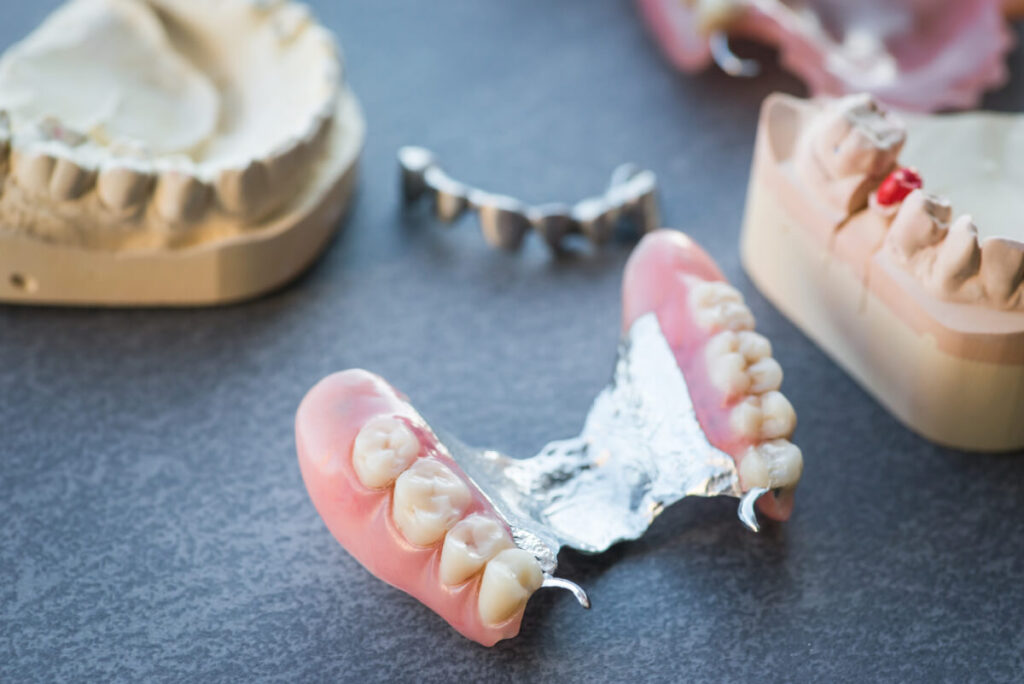 Get a Desirable and Confident Smile With Dentures